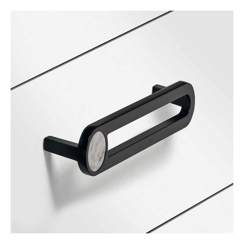 Moderne oval greb i sort zinklegering og marmor